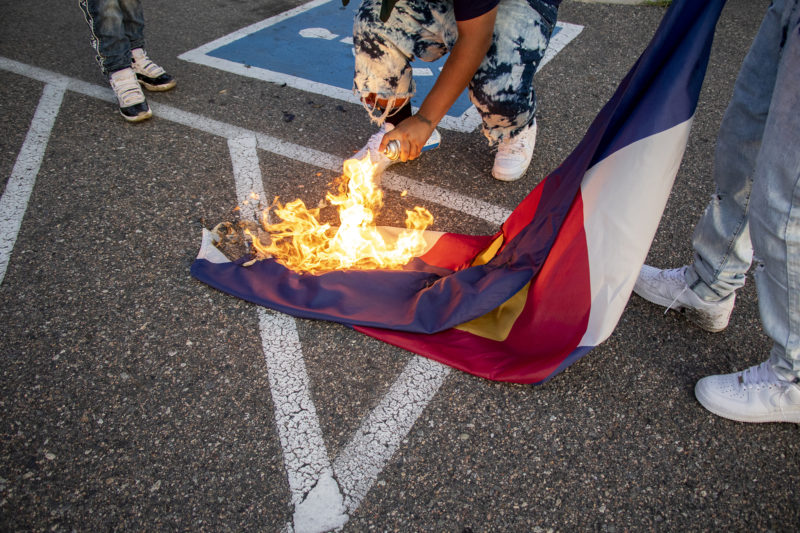 Aurora police are looking for the people who took down flags at the ...
