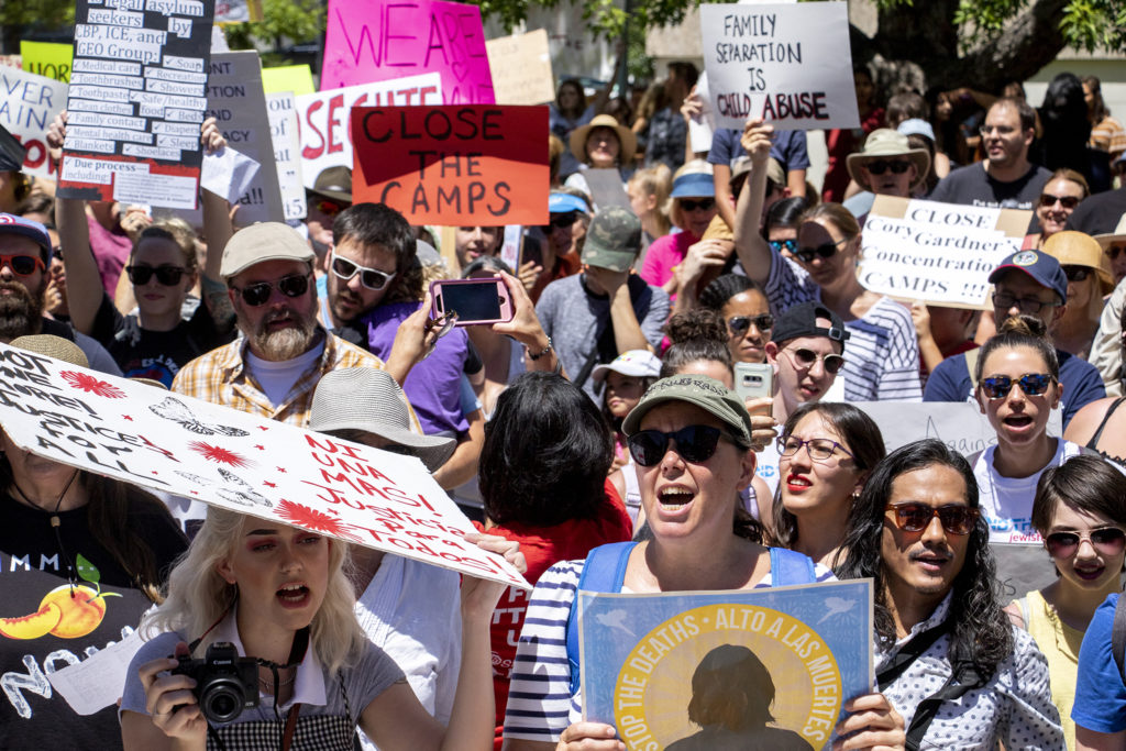 Immigration activists lobby Sen. Cory Gardner to defund ICE and support ...