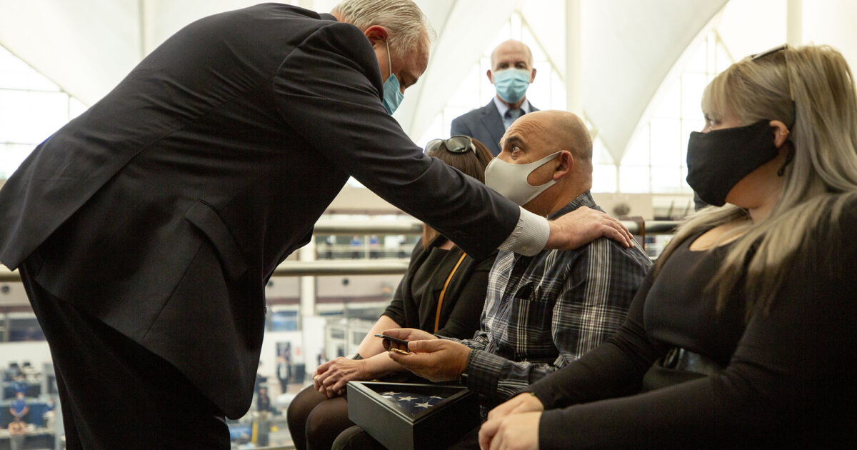 TSA honors a fallen agent as its brass pleads with passengers to be ...