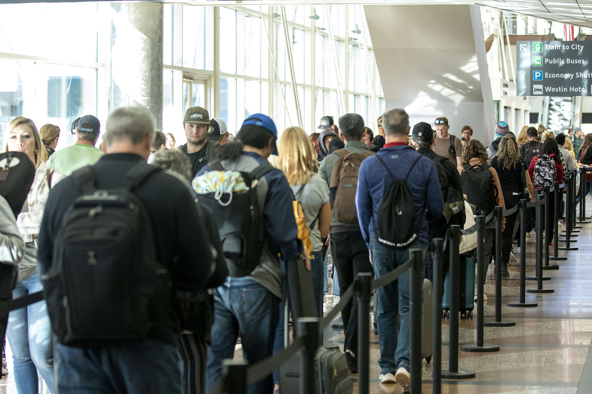 DIA is extending its program that lets travelers reserve a spot in line ...